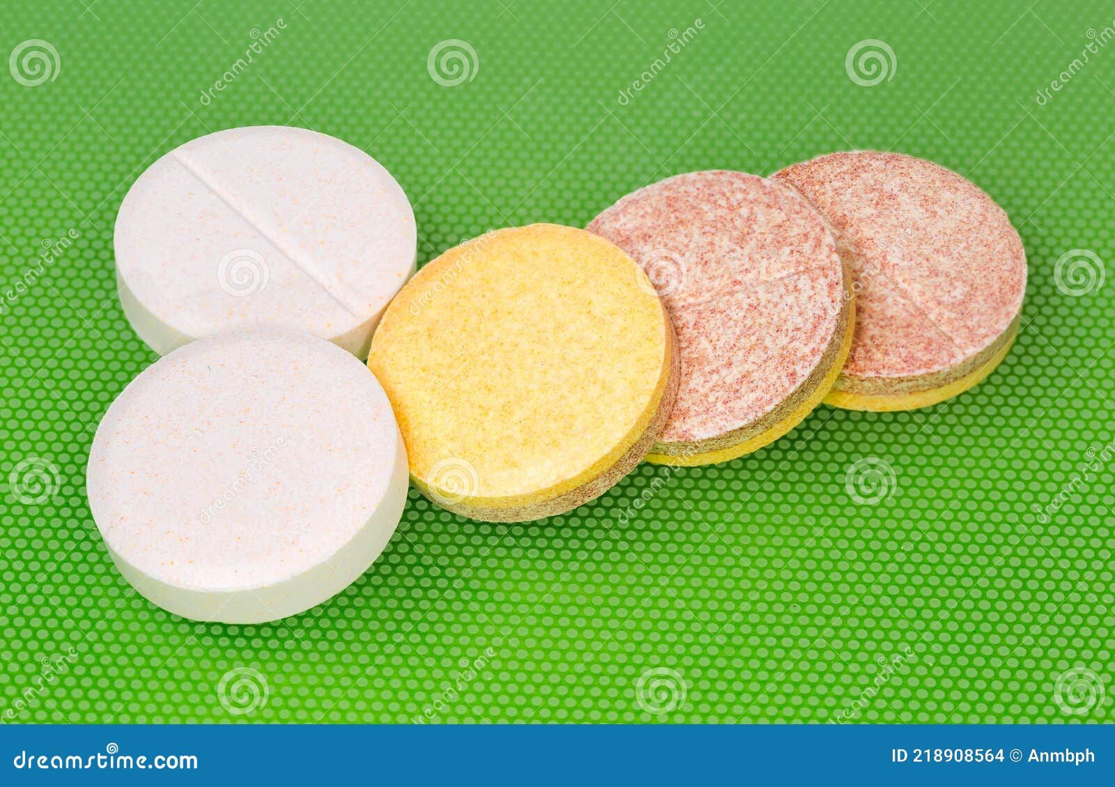 Effervescent Tablets on Green Surface, Close-up in Selective Focus ...