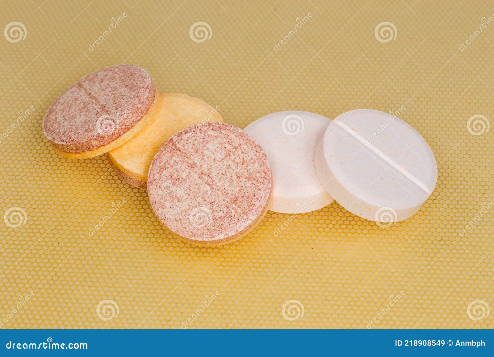 Effervescent Tablets on Yellow Surface, Close-up in Selective Focus ...