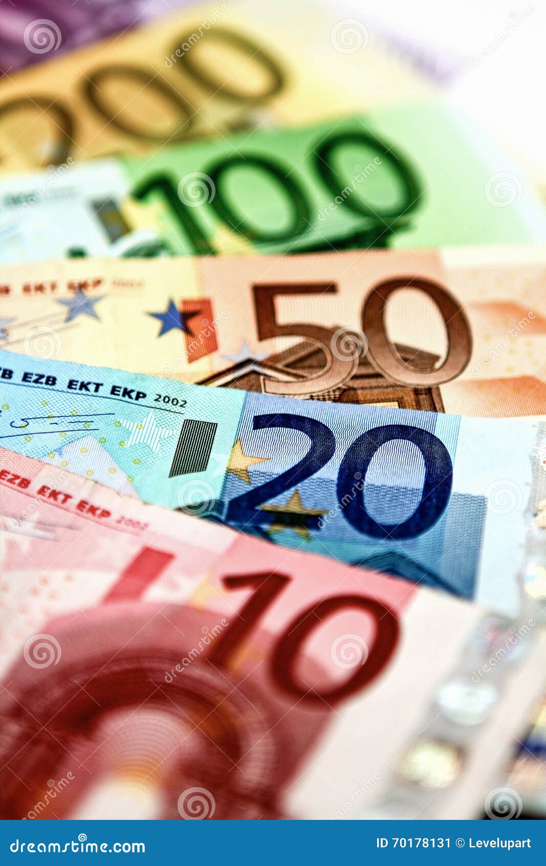 Different Euro Bills are Spread Out on a Table in the Form of a Stock ...