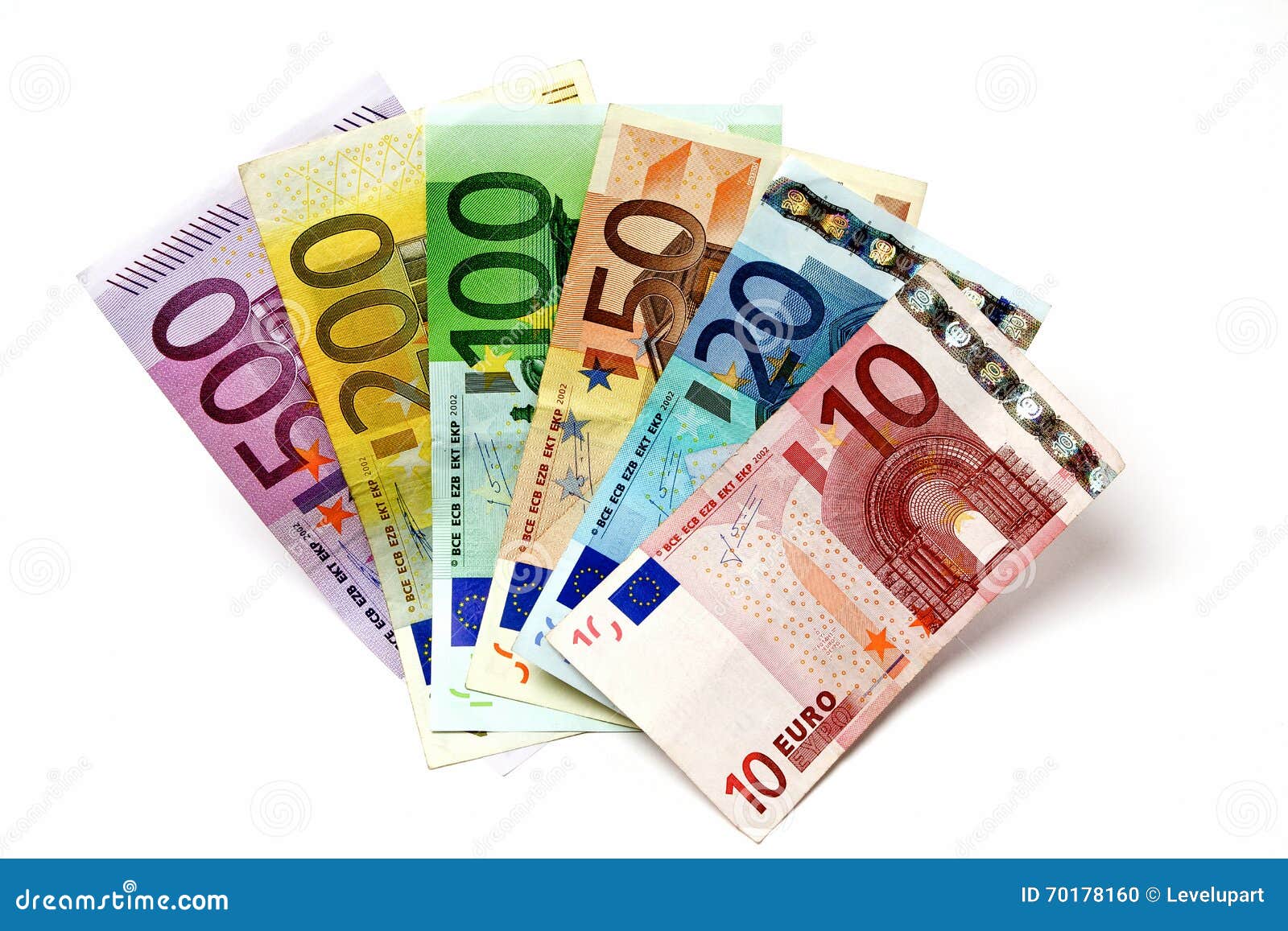 Different Euro Bills are Spread Out on a Table in the Form of a Stock ...