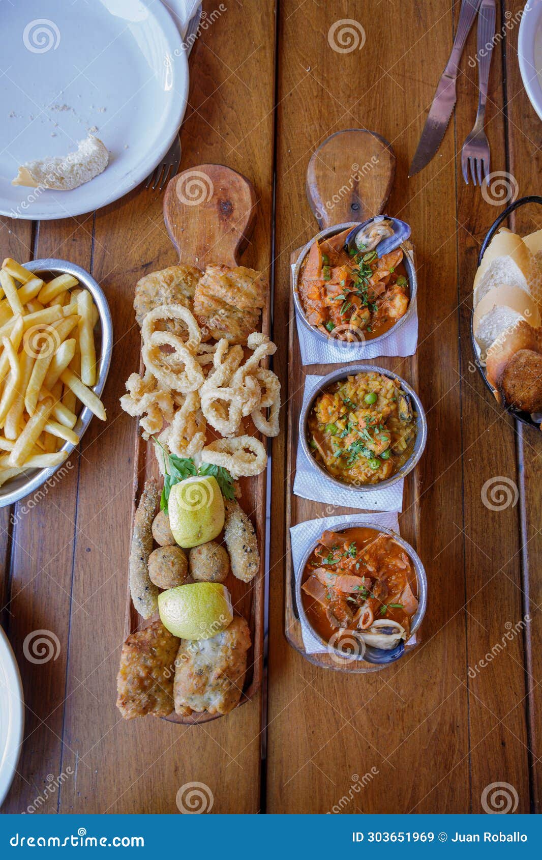 Different Fish Dishes and Seafood on a Restaurant Table Stock Image ...