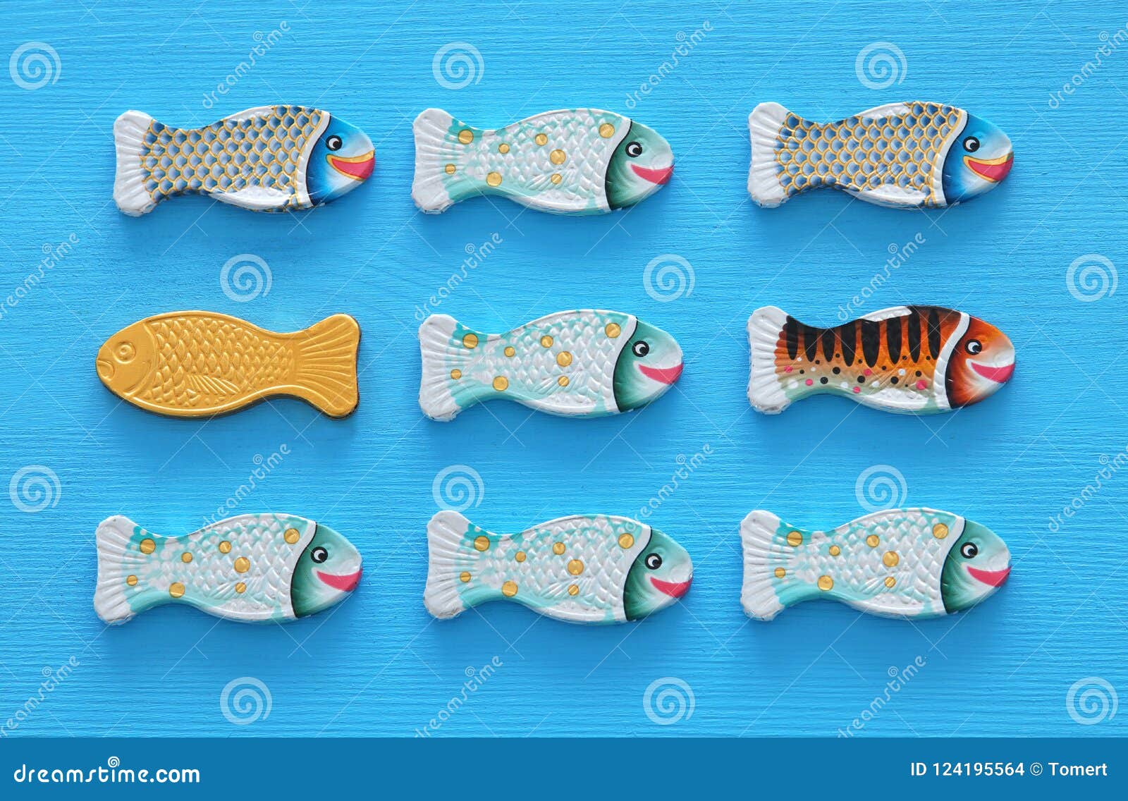 Different Fish Swimming Opposite Way of Identical Ones. Courage and ...