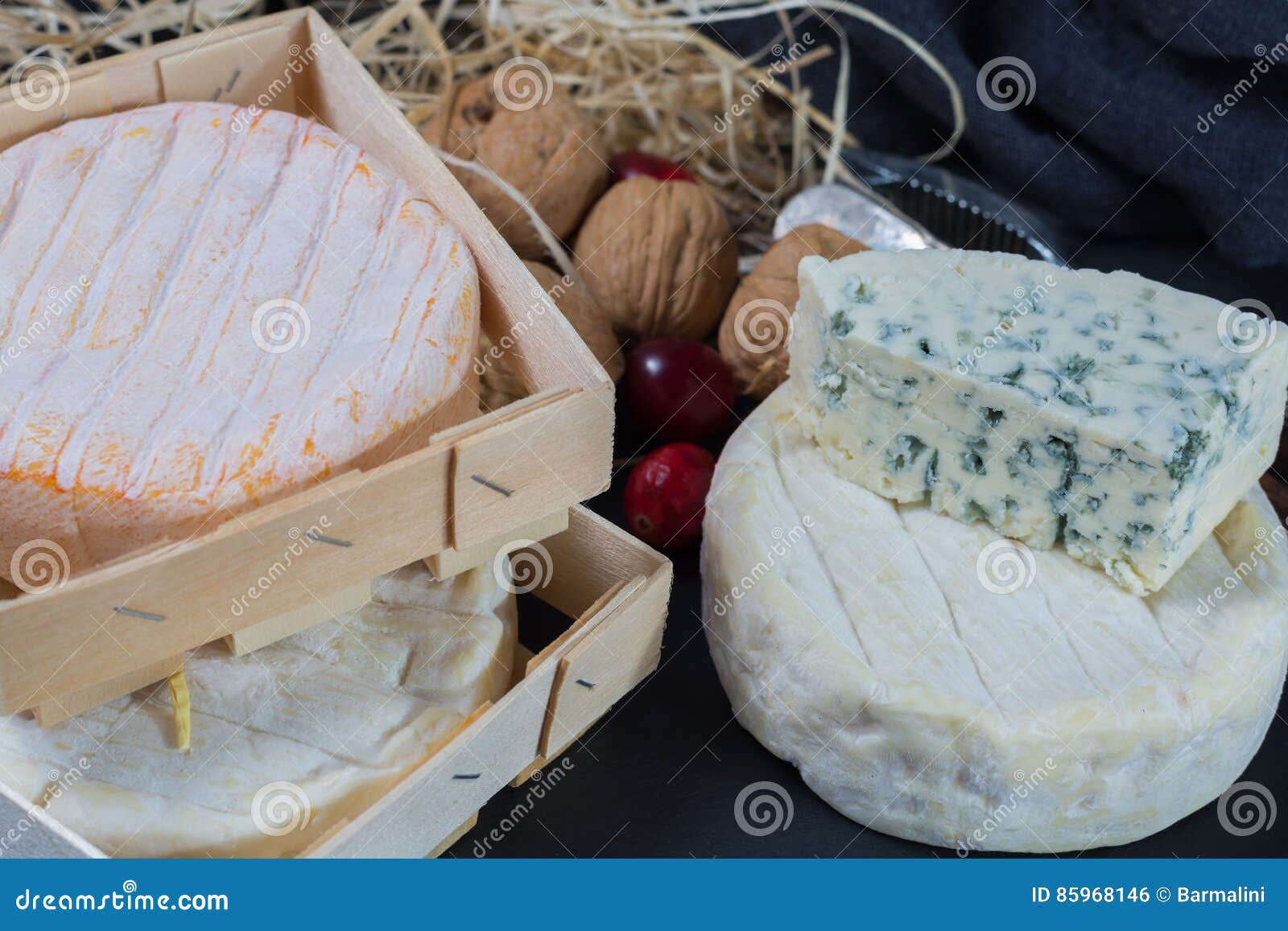 Different French Soft Cheeses on Black Stone Platter Stock Photo ...