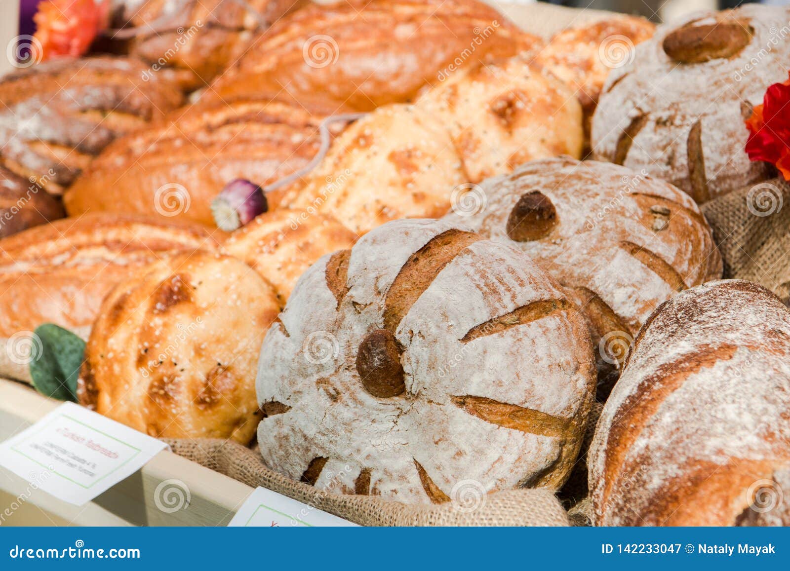 Different Fresh Bread on the Shelves in Bakery. Selective Focus Stock ...
