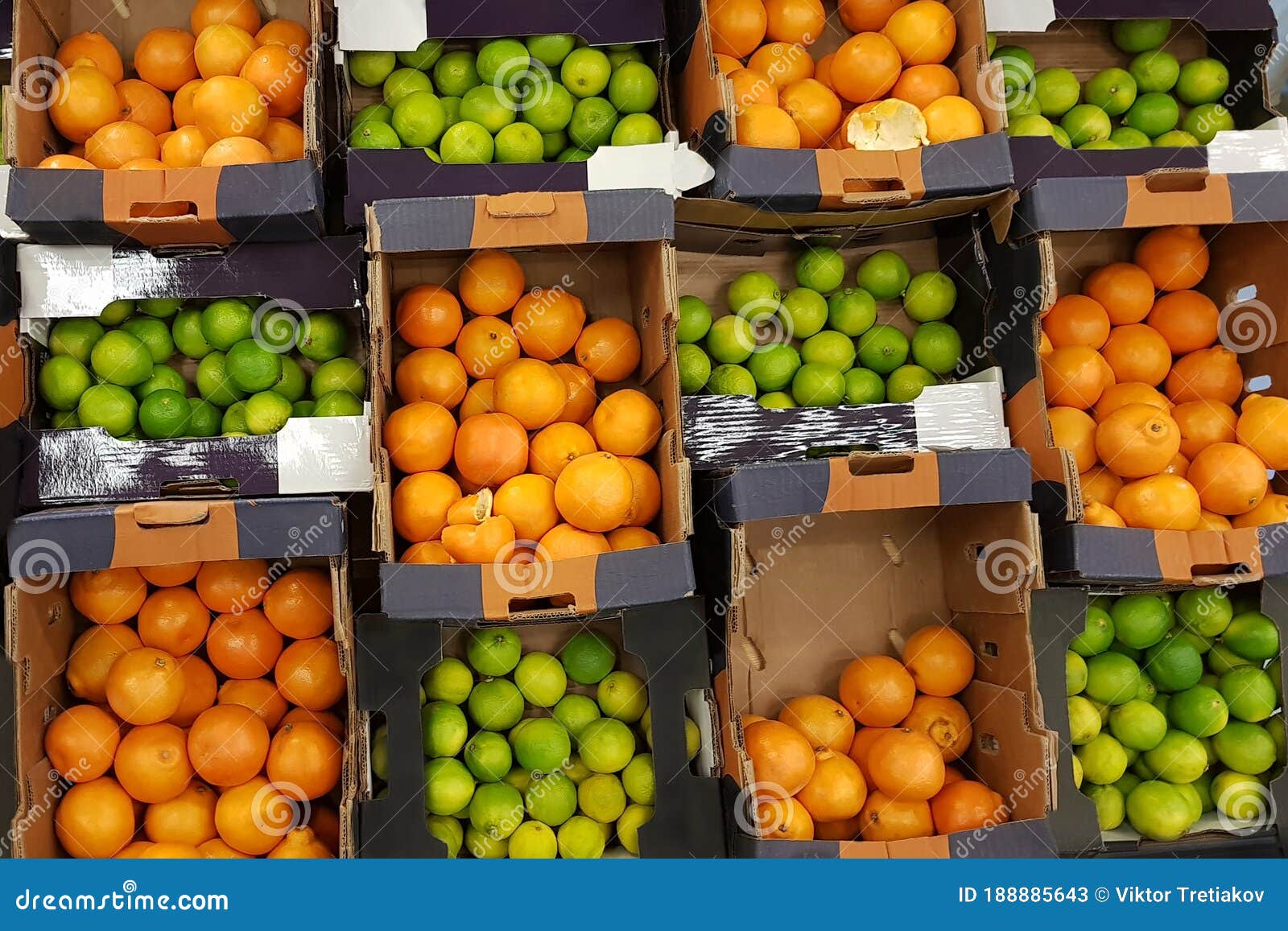 Different Fresh Citrus Fruits are on the Market in Cardboard Boxes ...