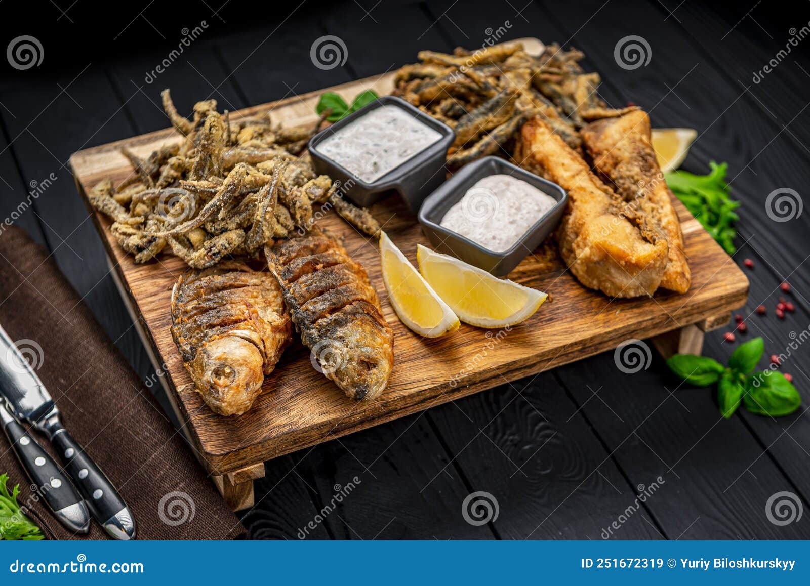 Different Fried Fish on the Board Stock Image - Image of board ...