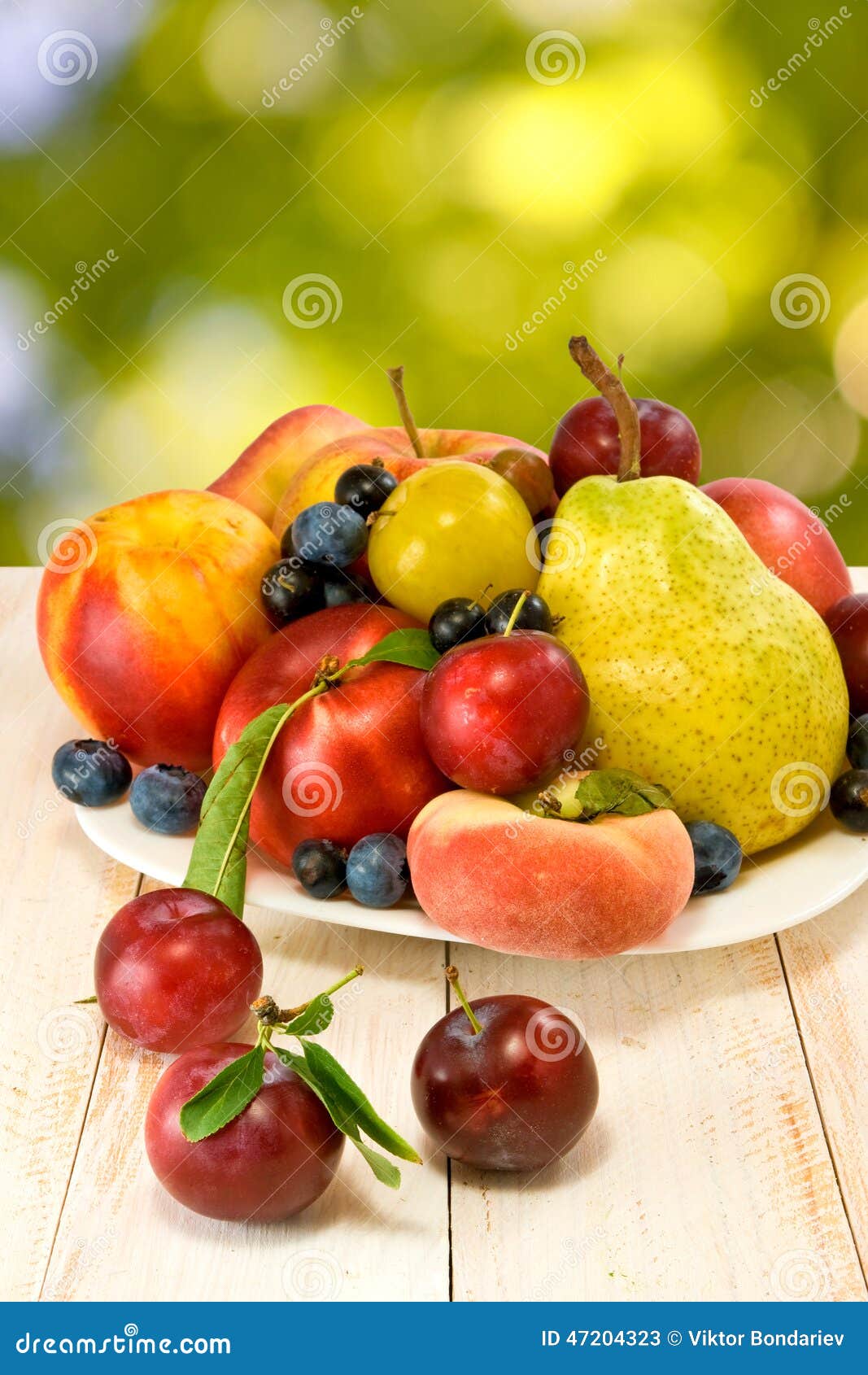 Different Fruits on the Table on a Blurred Background Stock Image ...