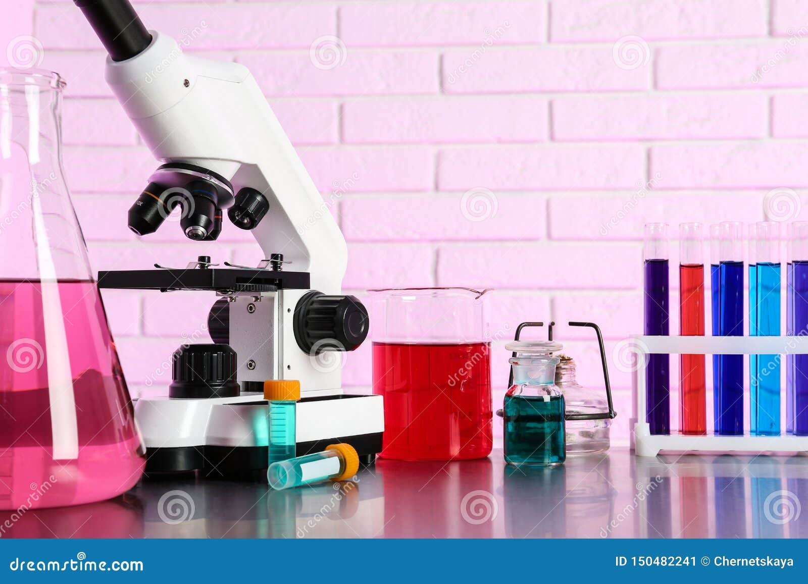 Different Glassware with Samples and Microscope on Table Stock Image ...