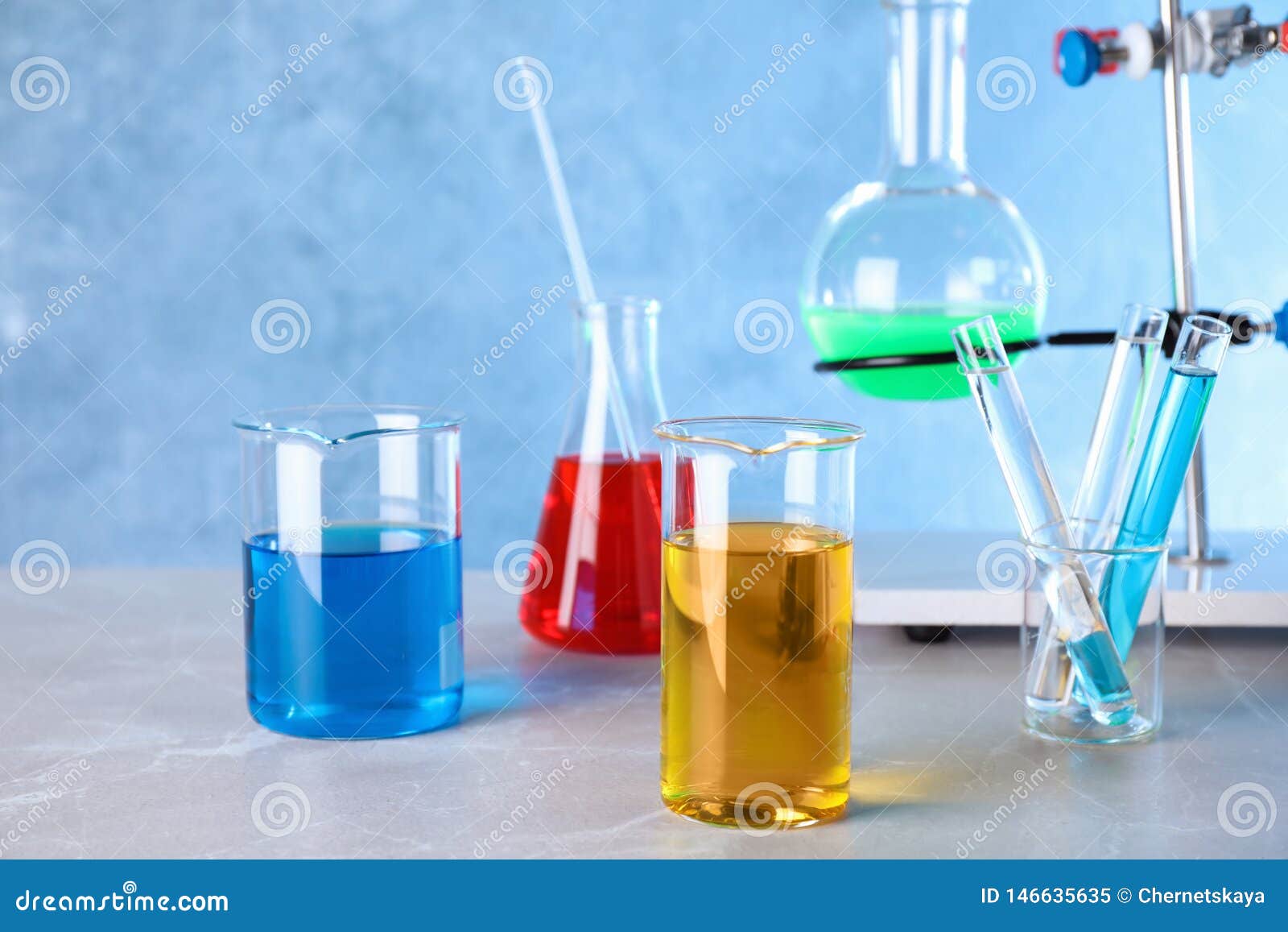 Different Glassware with Samples on Table in Laboratory Stock Image ...