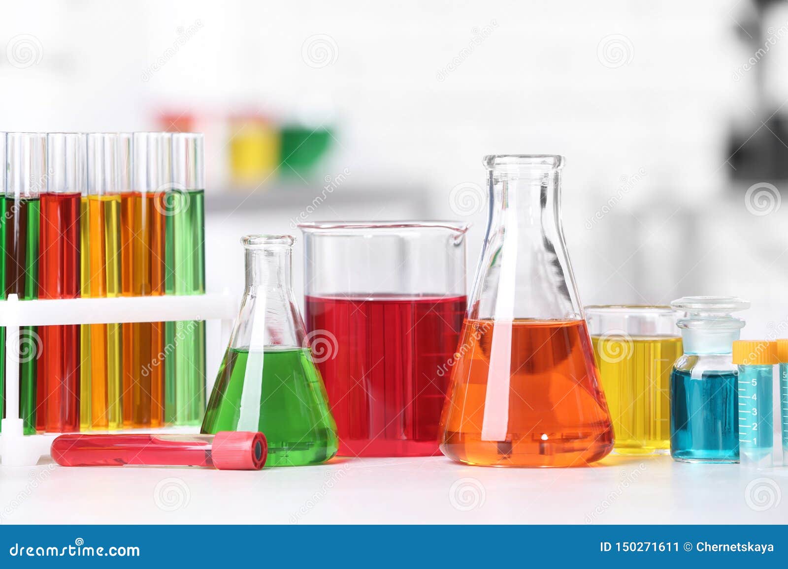 Different Glassware with Samples on Table in Laboratory Stock Image ...