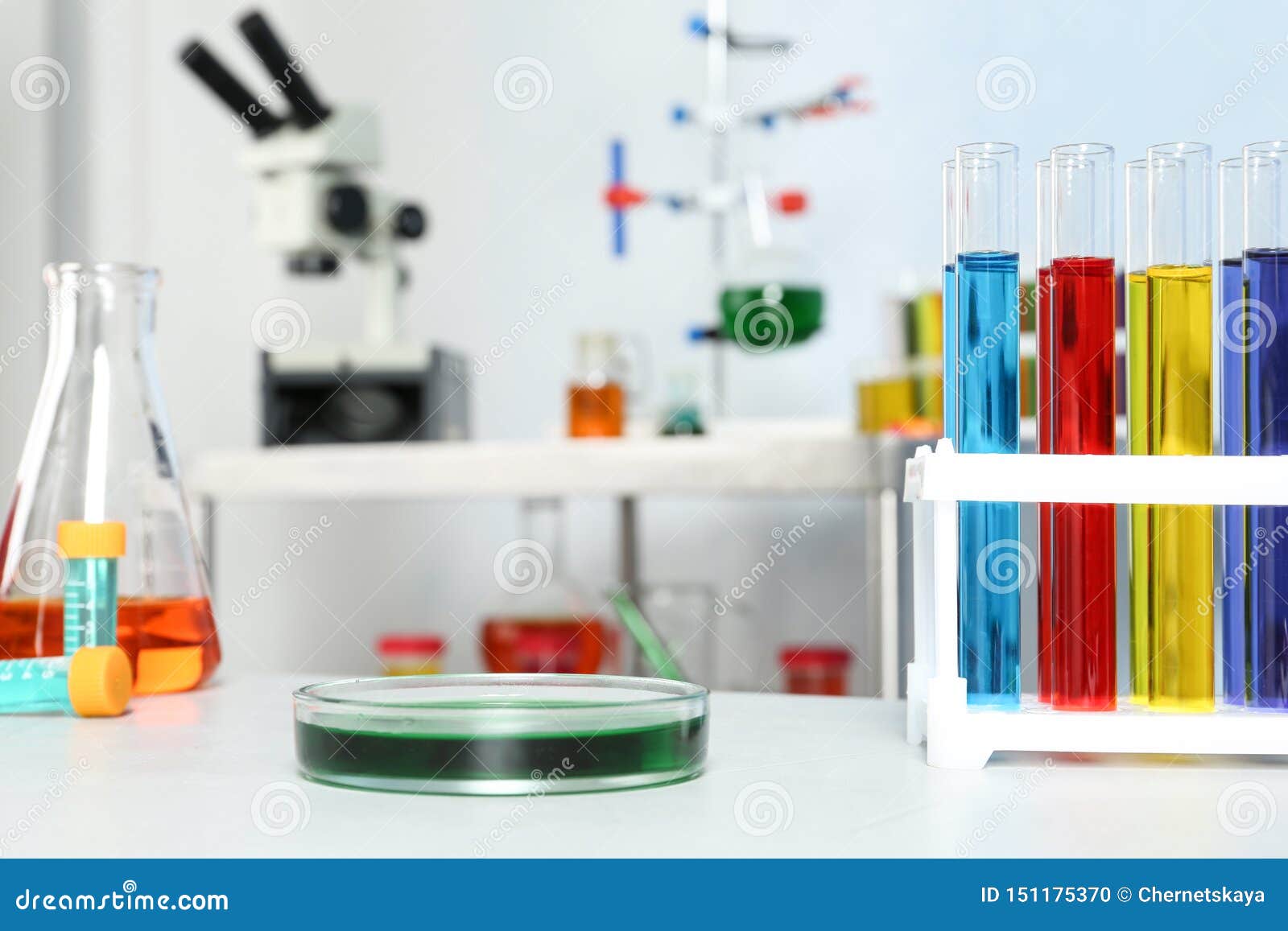 Different Glassware with Samples on Table in Laboratory Stock Photo ...