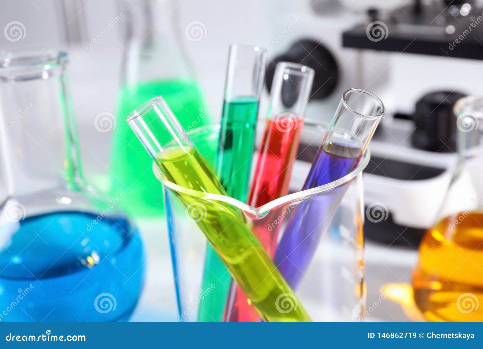 Different Glassware with Samples on Table in Chemistry Laboratory Stock ...