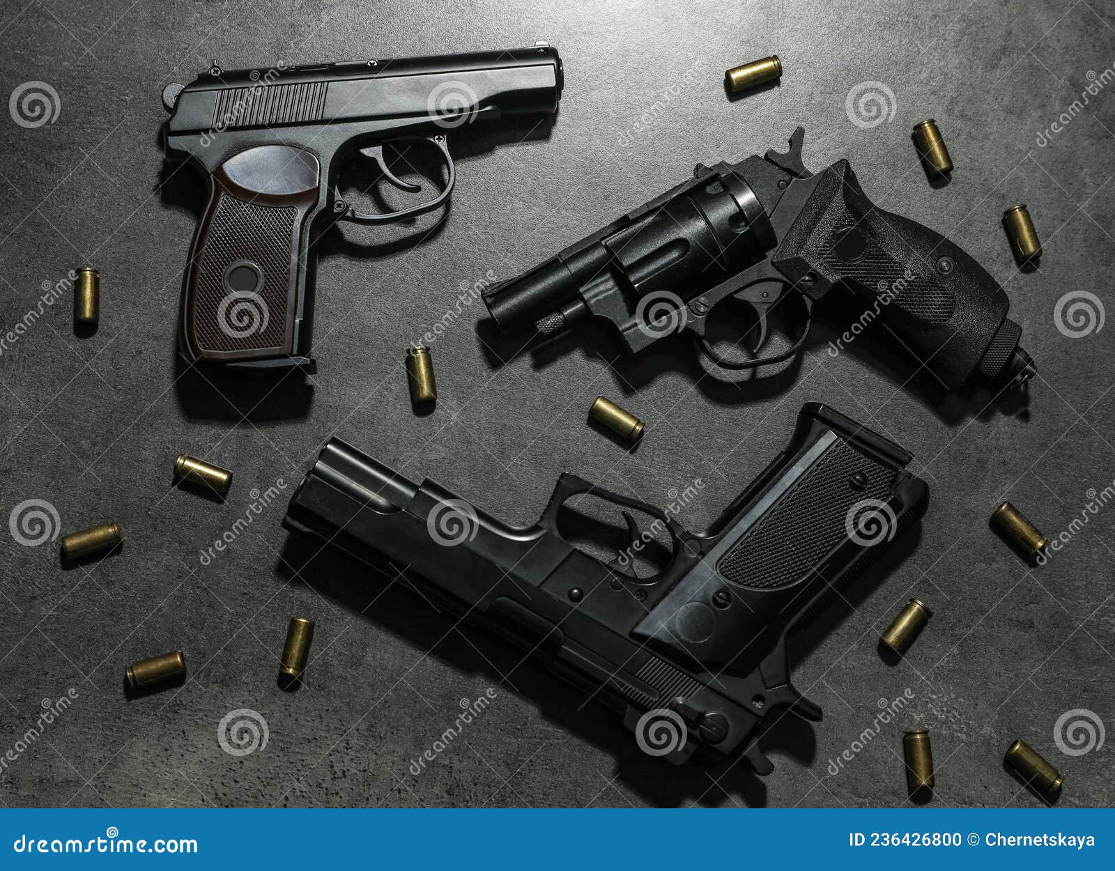 Different Guns and Bullets on Grey Table, Flat Lay Stock Photo - Image ...