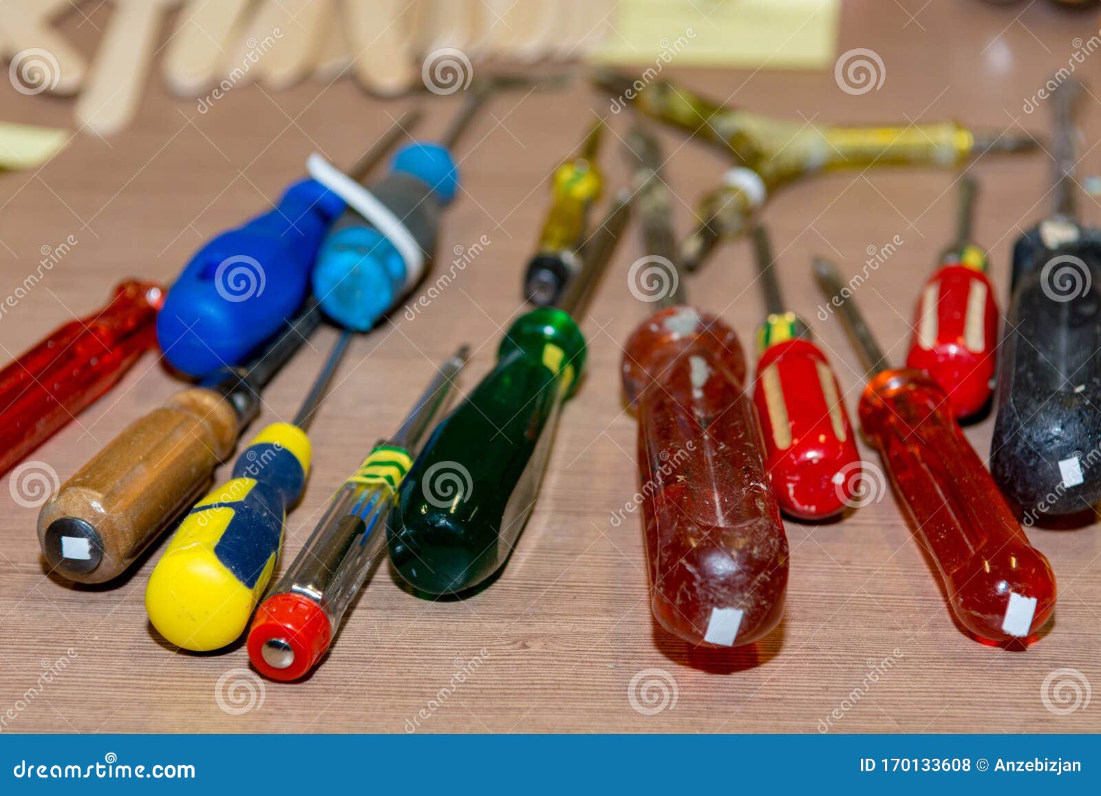 Different Hand Tools Stacked on a Wooden Table. Stock Photo - Image of ...