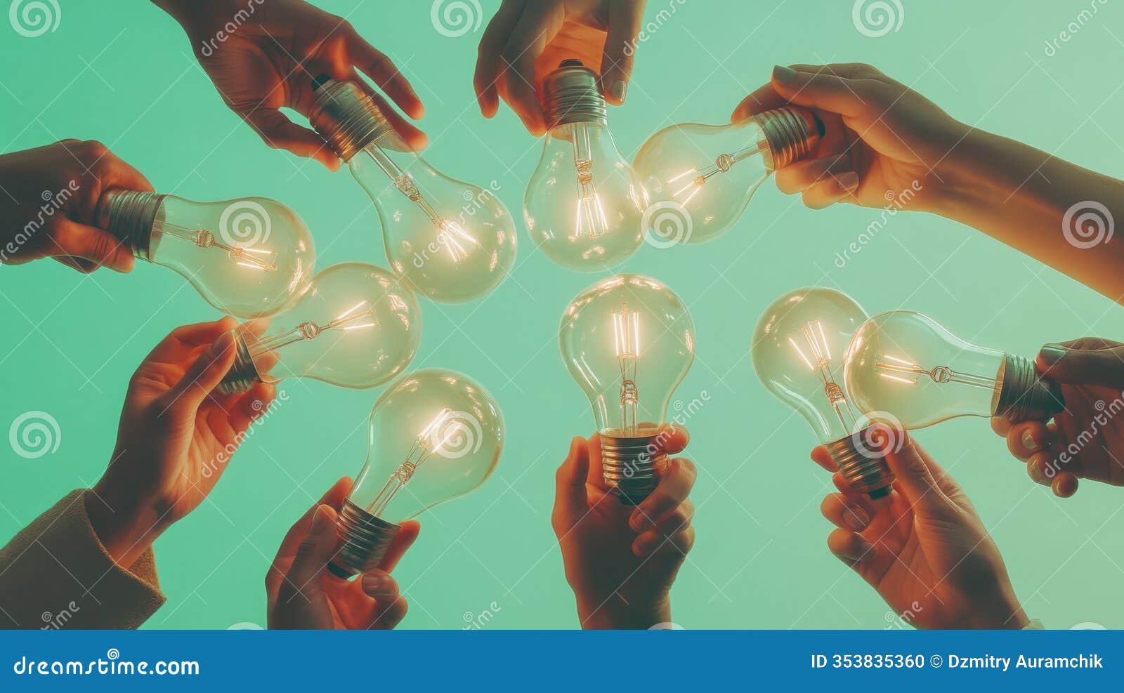 Different Hands Holding Light Bulbs To Symbolize Innovation and Ideas ...
