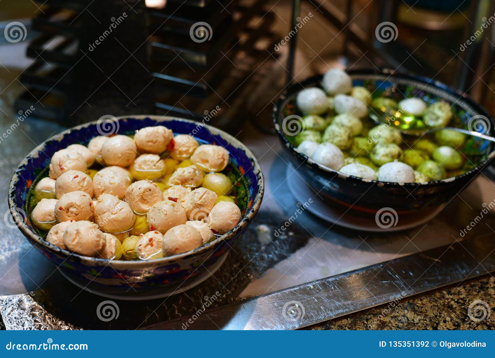 Different Hummus in the Form of Balls in Olive Oil Stock Photo - Image ...