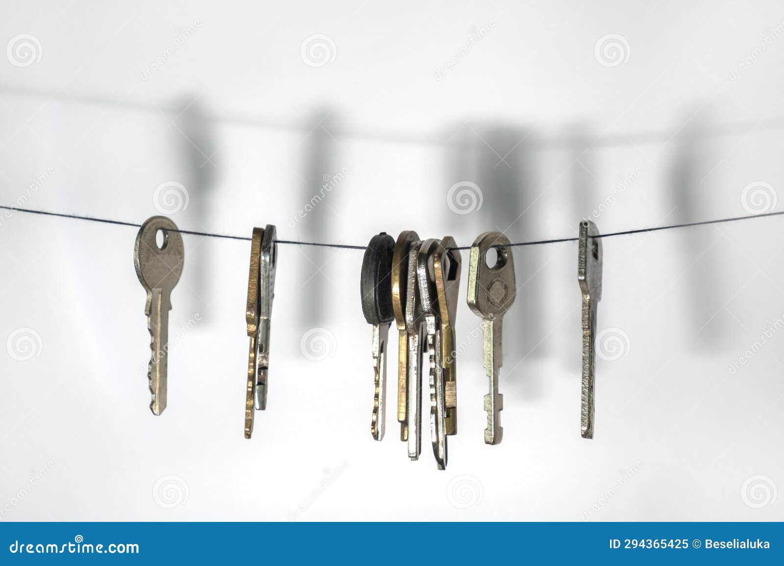 A Different Keys from Different Locks Hanging on String Stock Image ...