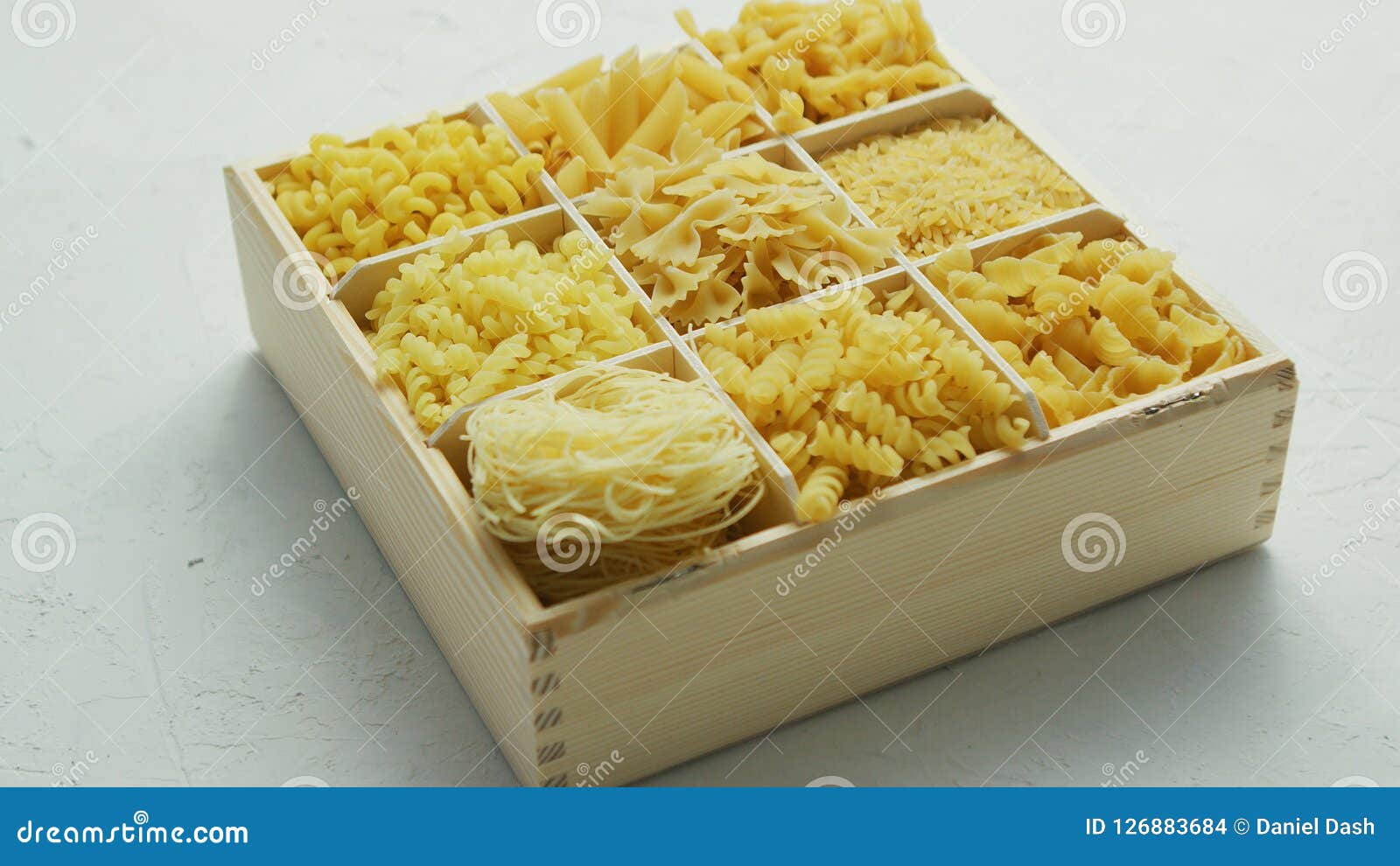 Macaroni Of Different Types On A Wooden Background Royalty-Free Stock ...