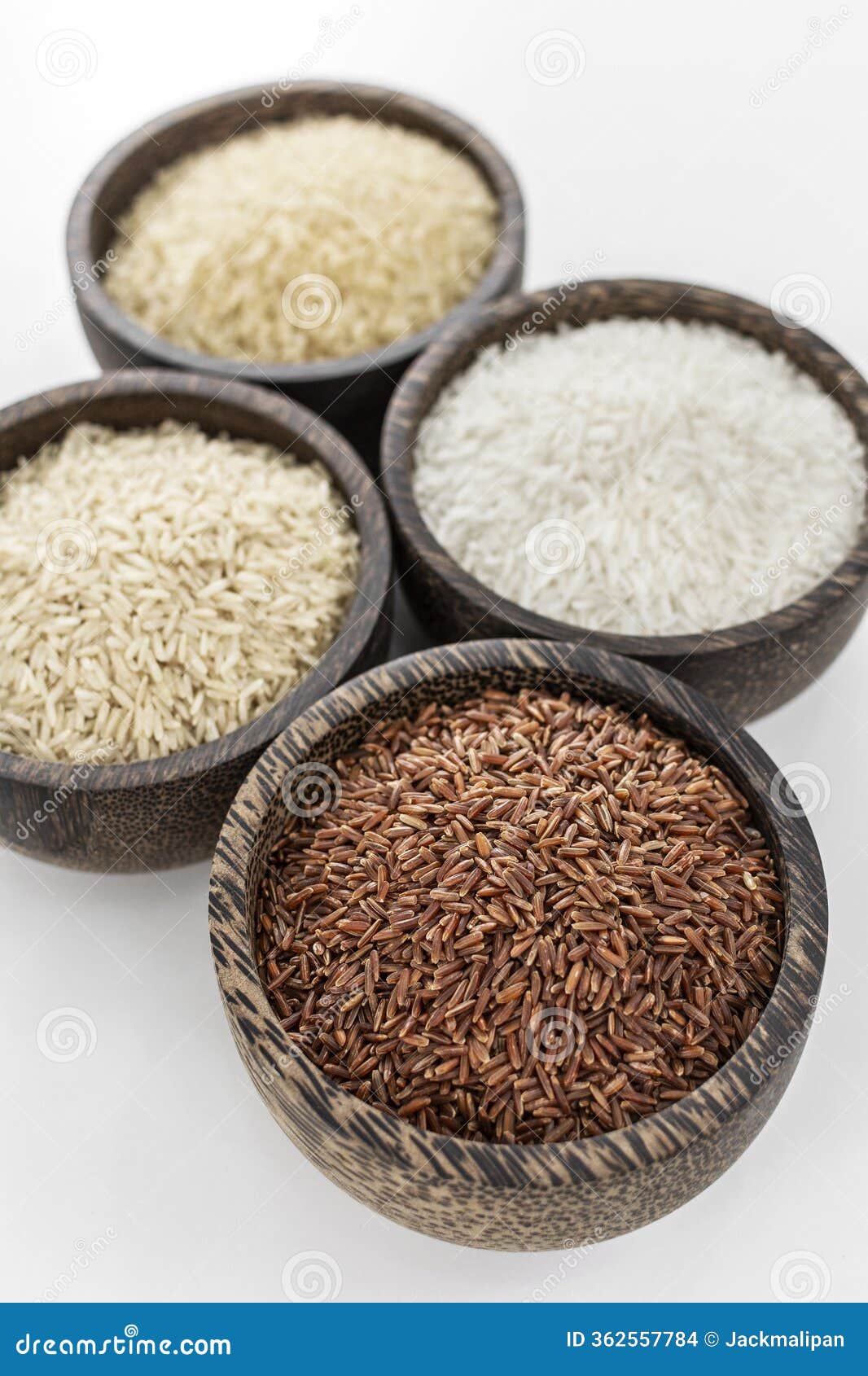 Different Kinds of Asian Rice Grains in Bowls on White Background Stock ...