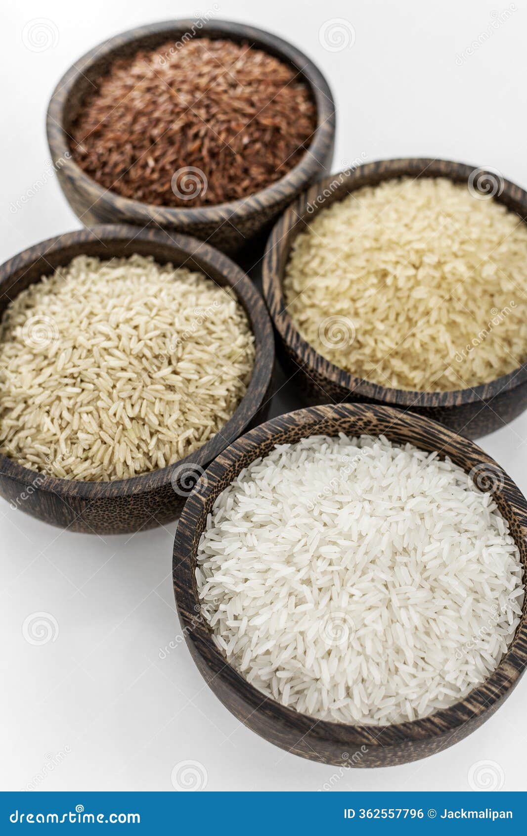 Different Kinds of Asian Rice Grains in Bowls on White Background Stock ...