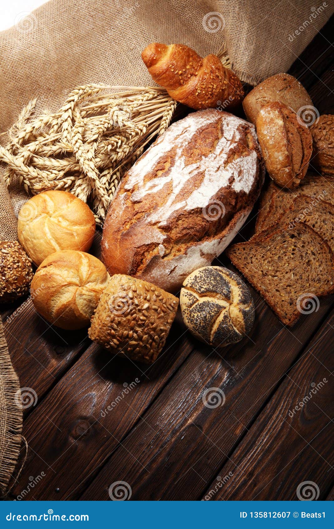 Different Kinds of Bread and Bread Rolls on Board from Above Stock ...