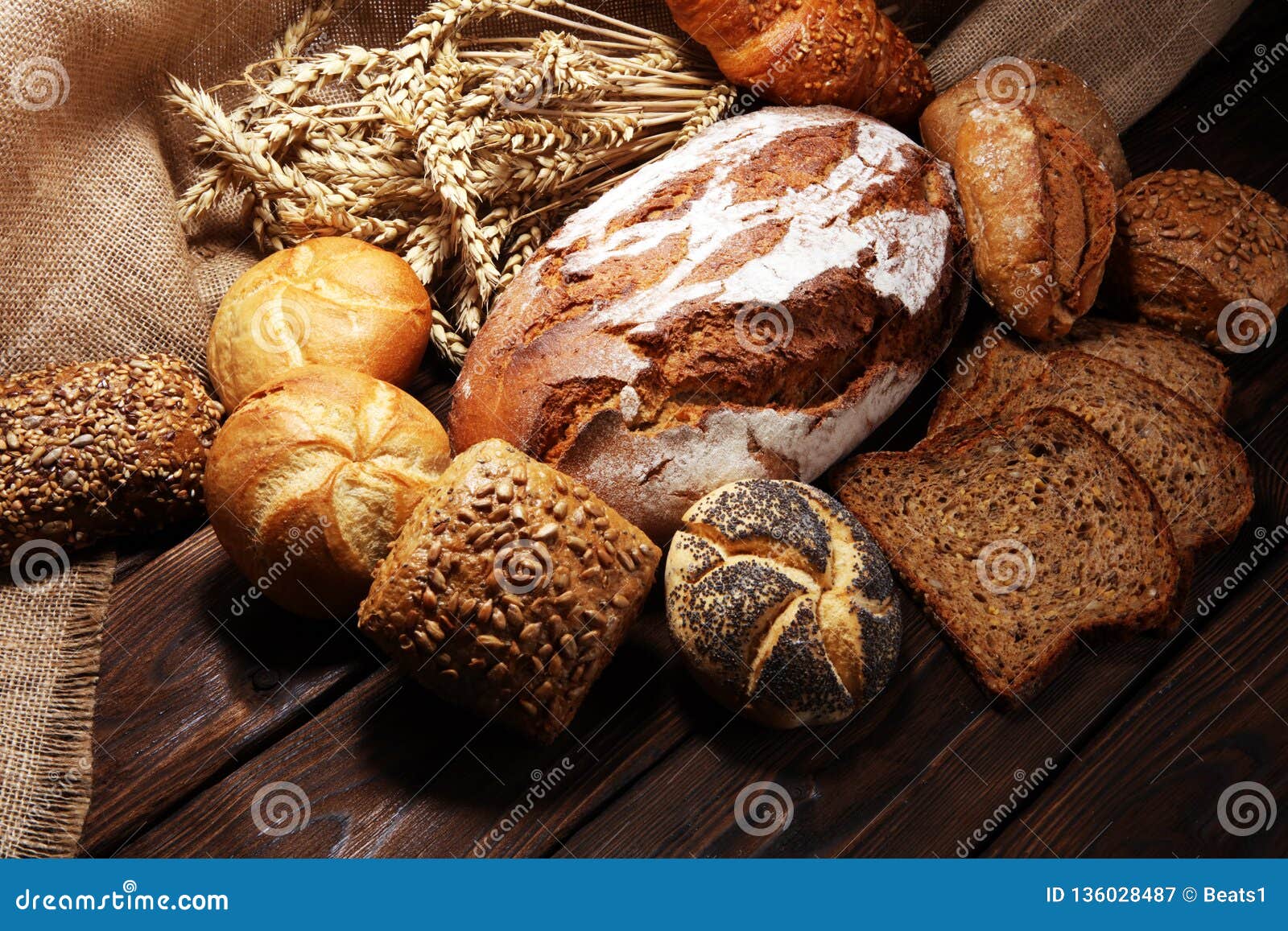 Different Kinds of Bread and Bread Rolls on Board from Above Stock ...