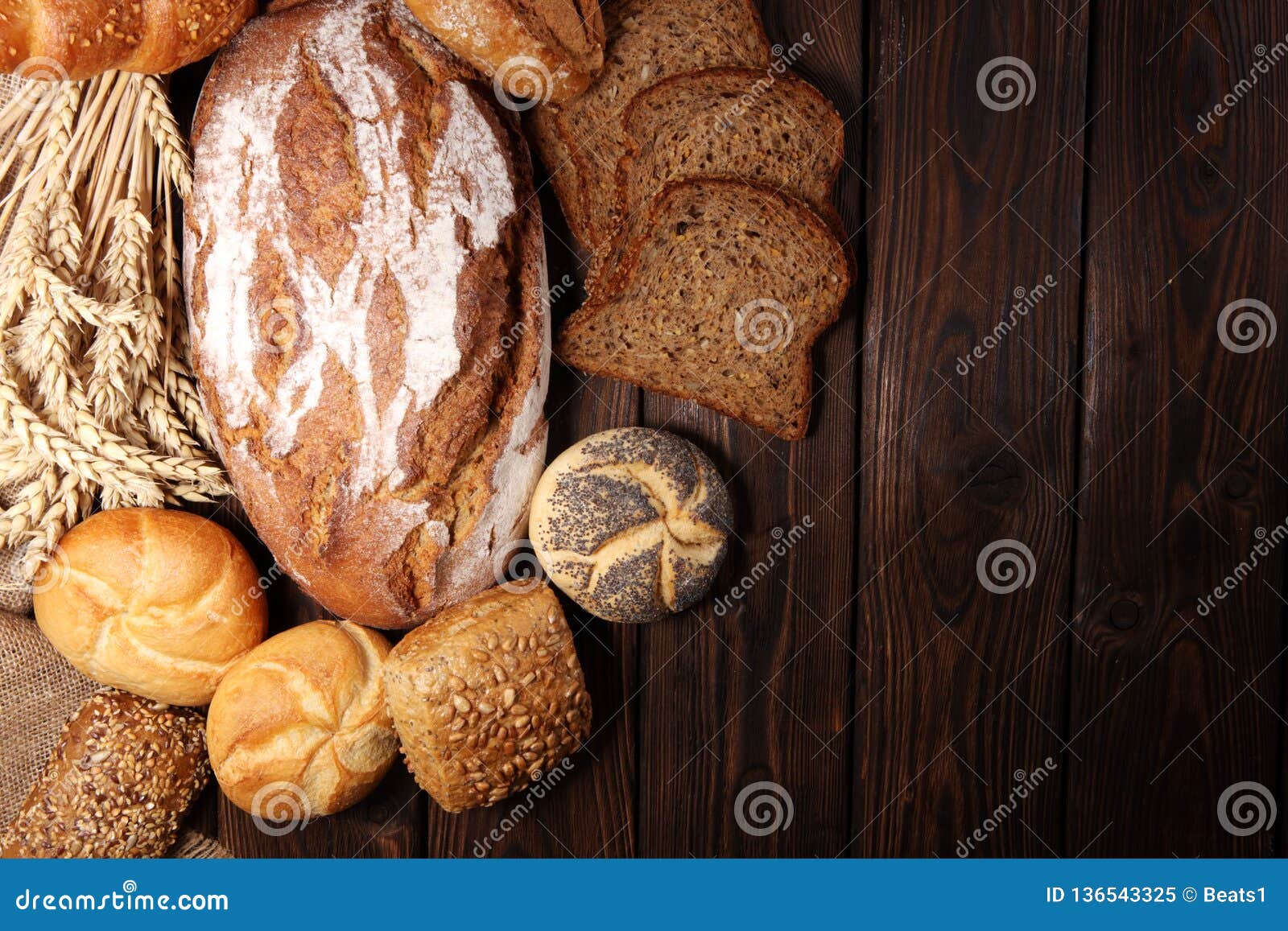 Different Kinds of Bread and Bread Rolls on Board from Above Stock ...