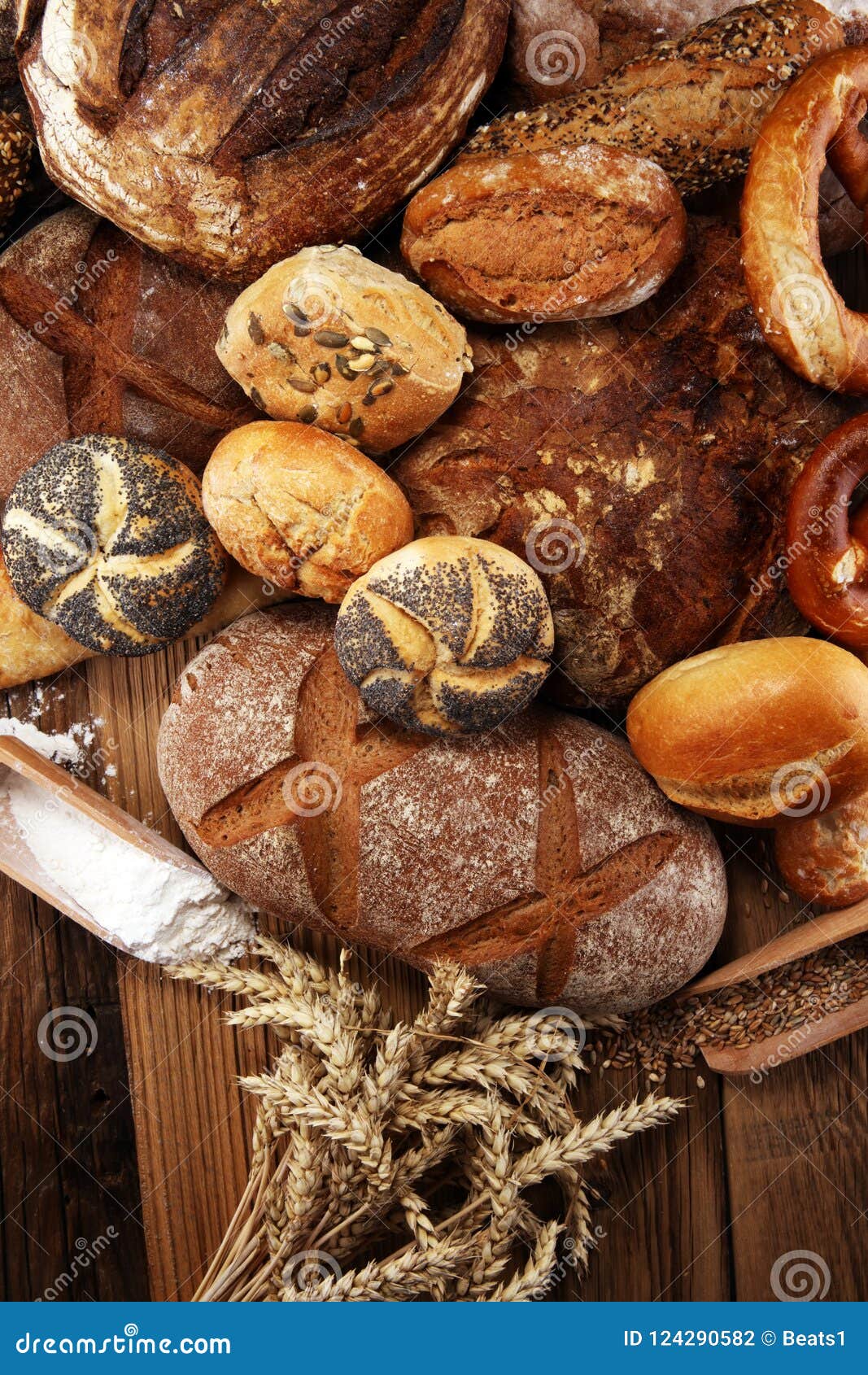 Different Kinds of Bread and Bread Rolls on Board from Above. Kitchen ...