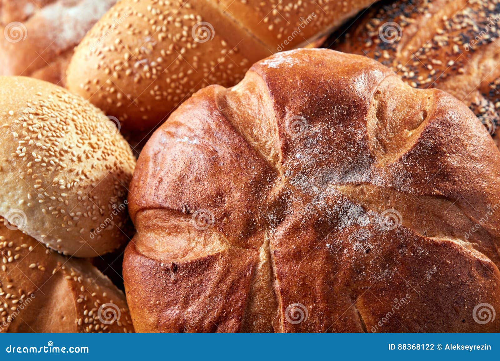 Different Kinds of Bread and Bread Rolls on Board from Above. Kitchen ...