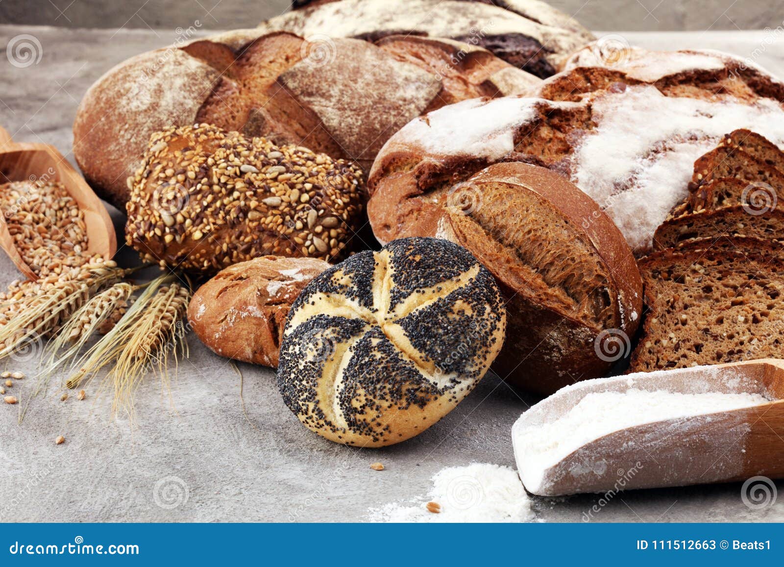 Different Kinds of Bread and Bread Rolls. Kitchen or Bakery Post Stock ...