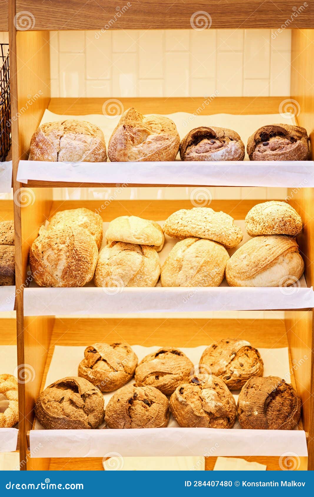 Different Kinds of Bread on the Counter in the Bakery Shop. Fresh Bread ...