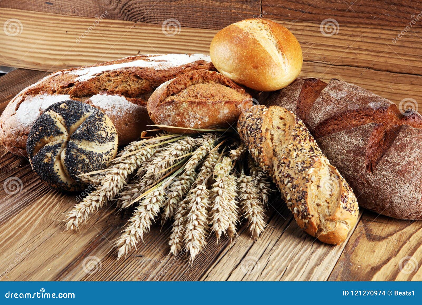 Different Kinds of Bread and Bread Rolls on Board from Above. Kitchen ...