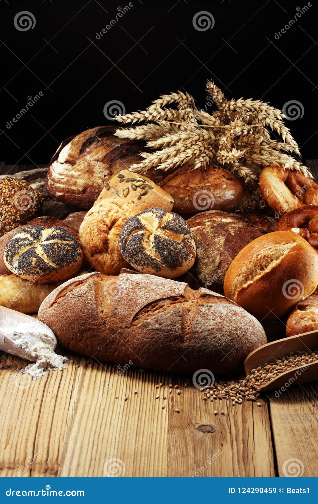Different Kinds of Bread and Bread Rolls on Board from Above. Kitchen ...