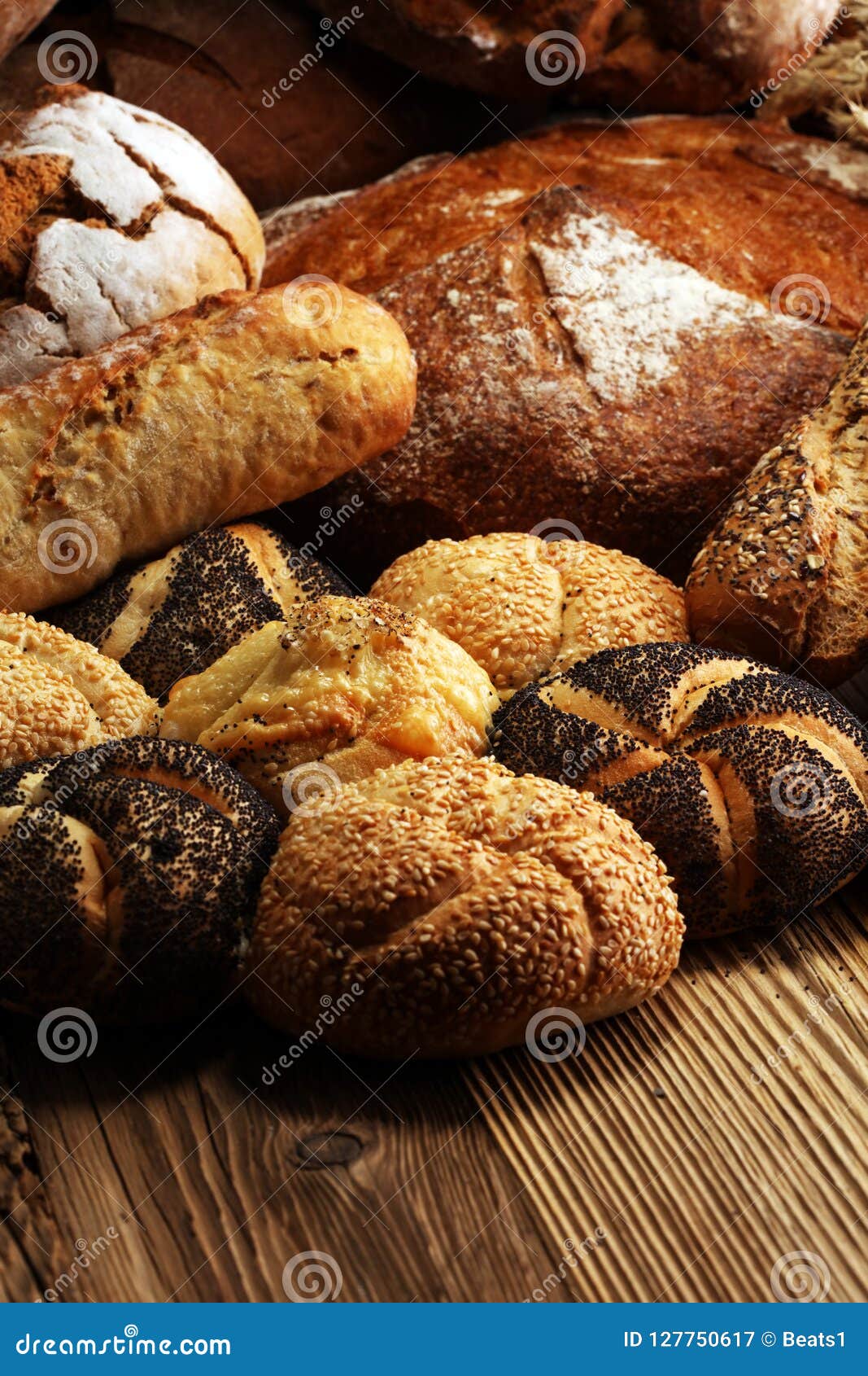 Different Kinds of Bread and Bread Rolls on Board from Above. Kitchen ...