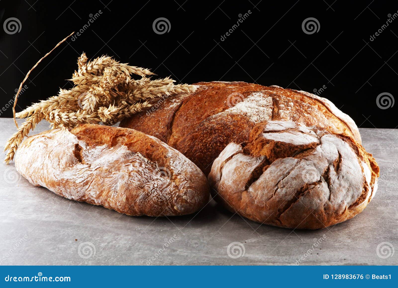 Different Kinds of Bread and Bread Rolls on Board from Above. Kitchen ...