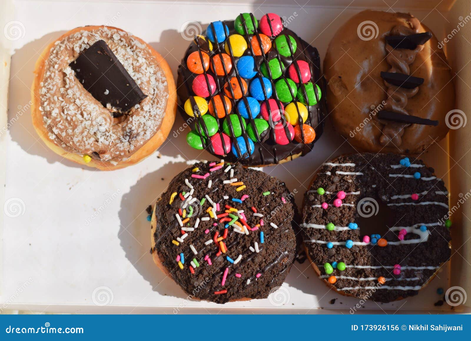 Different Kinds of Donuts Kept in a Box Stock Photo - Image of ...