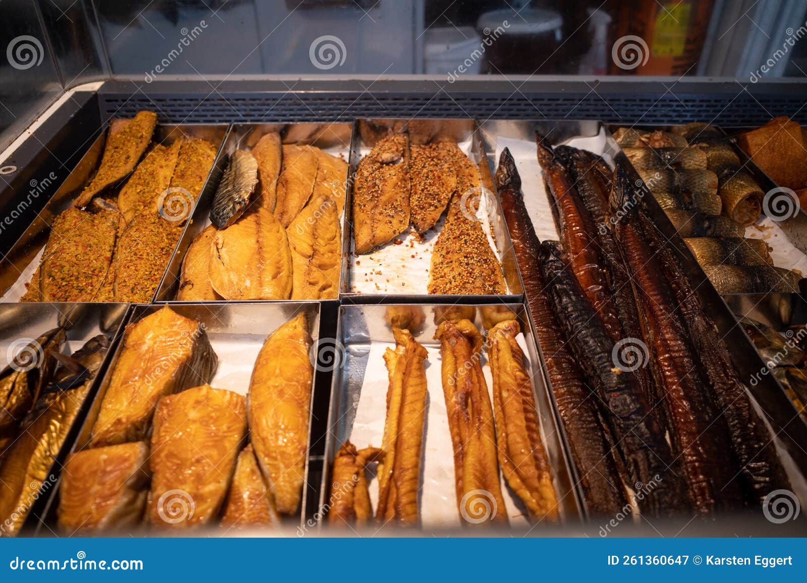Different Kinds of Smoked Fish Lies in the Display of a Store Stock ...