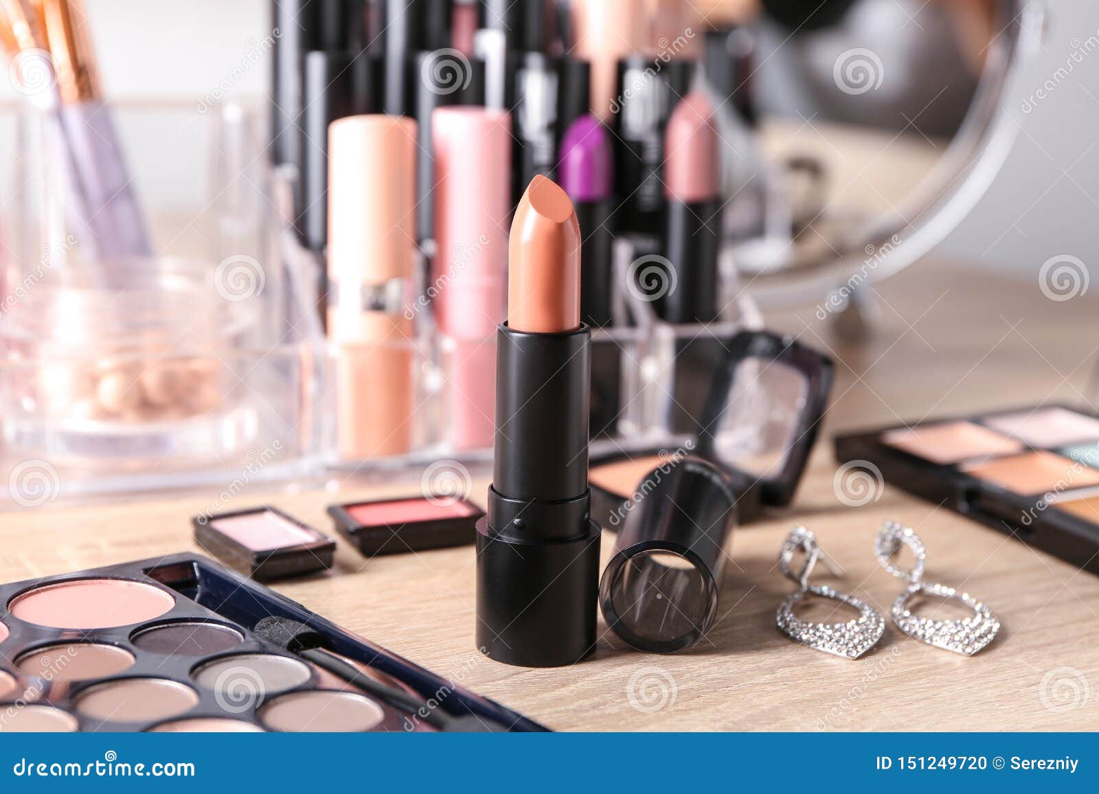 Different Lipsticks and Other Cosmetics on Table Stock Photo - Image of ...
