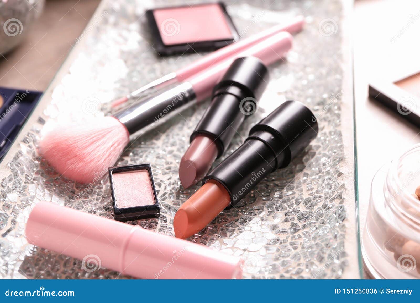 Different Lipsticks and Other Cosmetics on Table Stock Photo - Image of ...