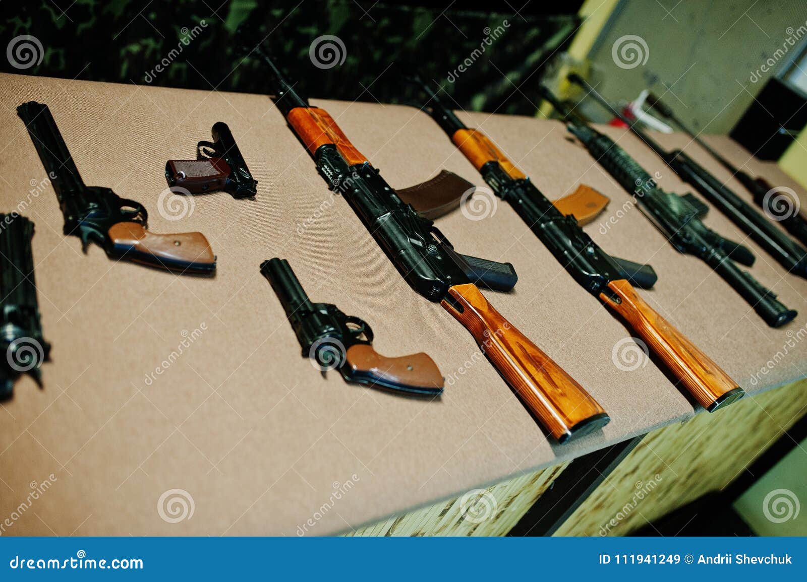 Different Machine Guns And Gun Revolvers On Shooting Range. Royalty ...