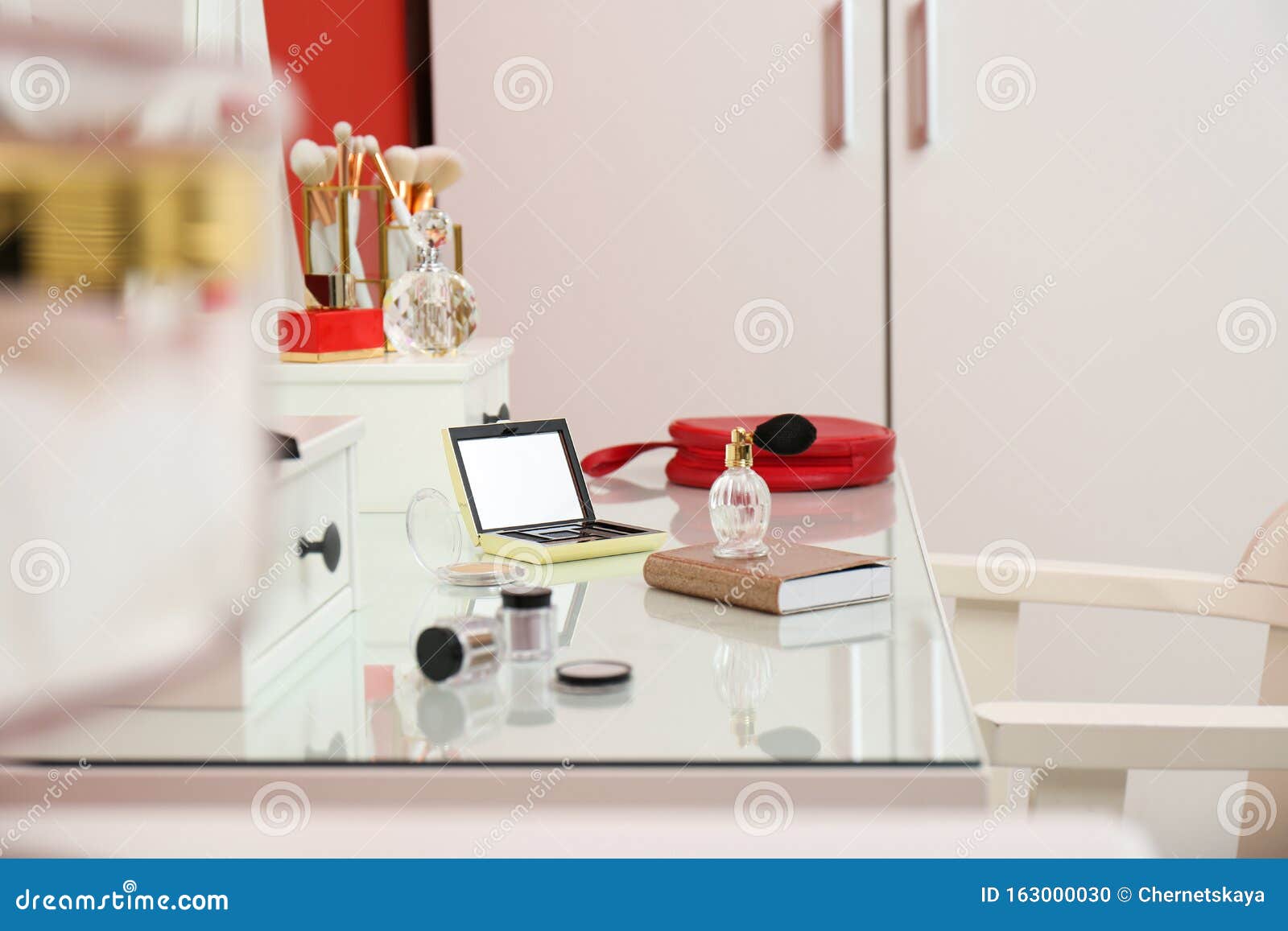 Different Makeup Products on White Table Stock Photo - Image of table ...