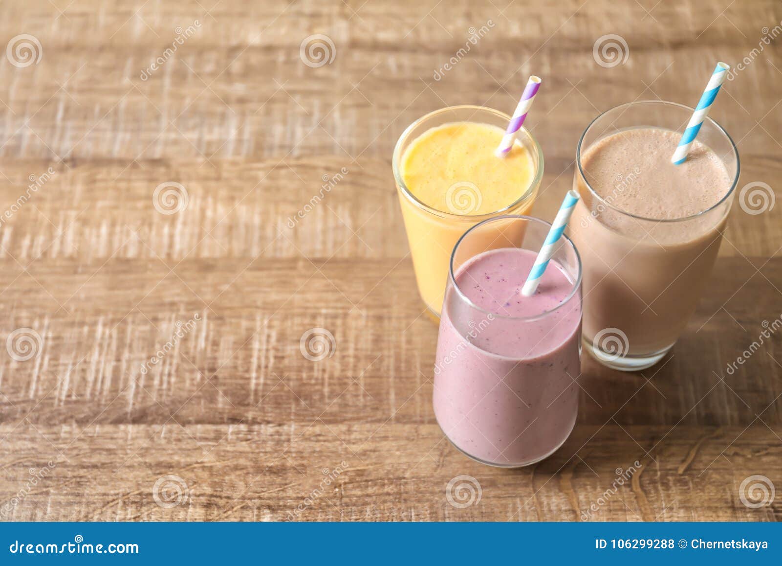 Different Milkshakes in Glasses on Background Stock Photo - Image of ...