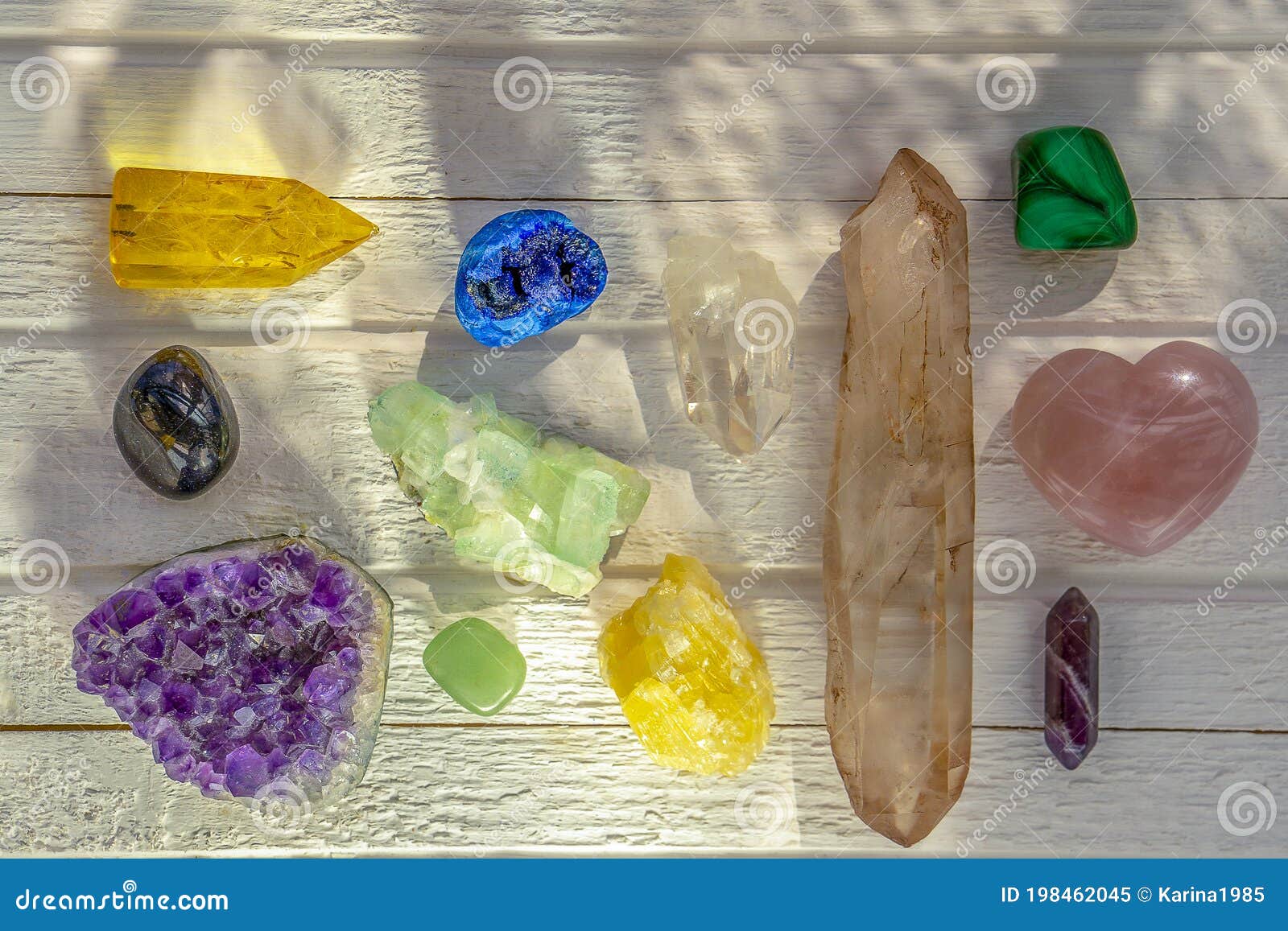 Different Minerals and Crystals on the White Wooden Background Stock ...
