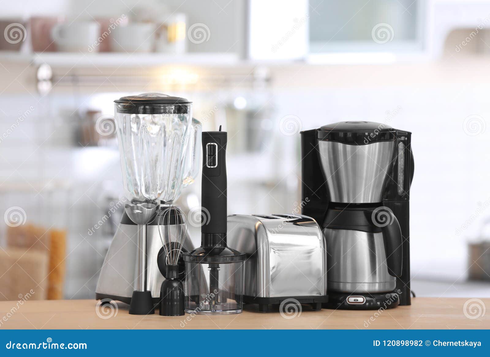 Different Modern Kitchen Appliances on Table Stock Photo - Image of ...