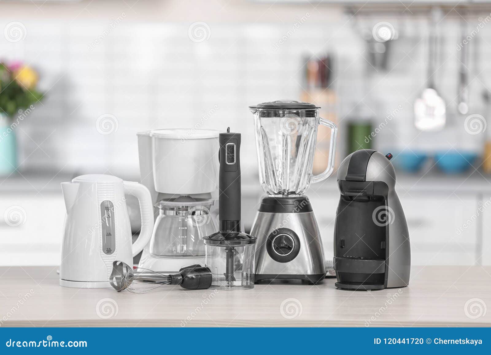 Different Modern Kitchen Appliances on Table Indoors. Stock Photo ...