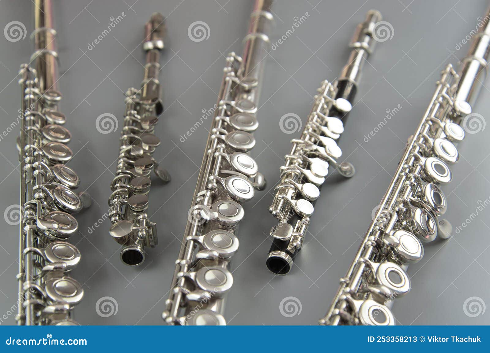 Different Musical Instruments Flute Stacked on a Gray Surface Stock ...