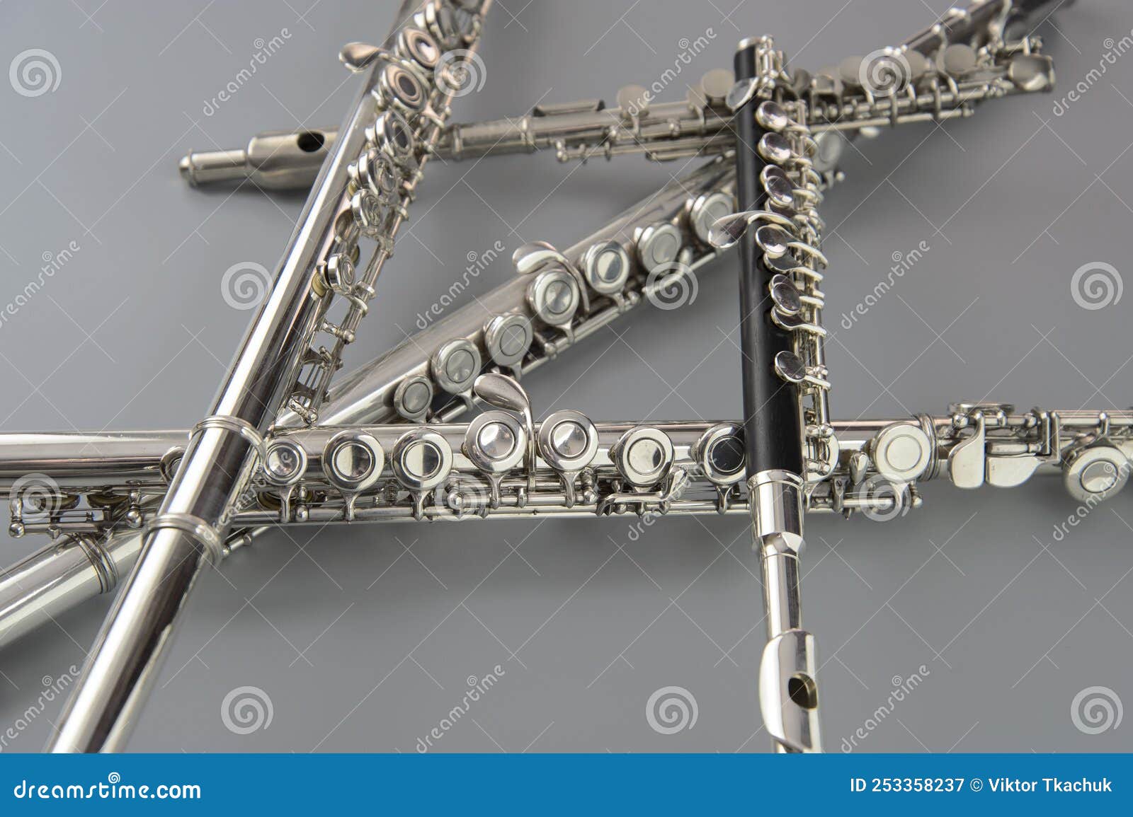 Different Musical Instruments Flute Stacked on a Gray Surface Stock ...