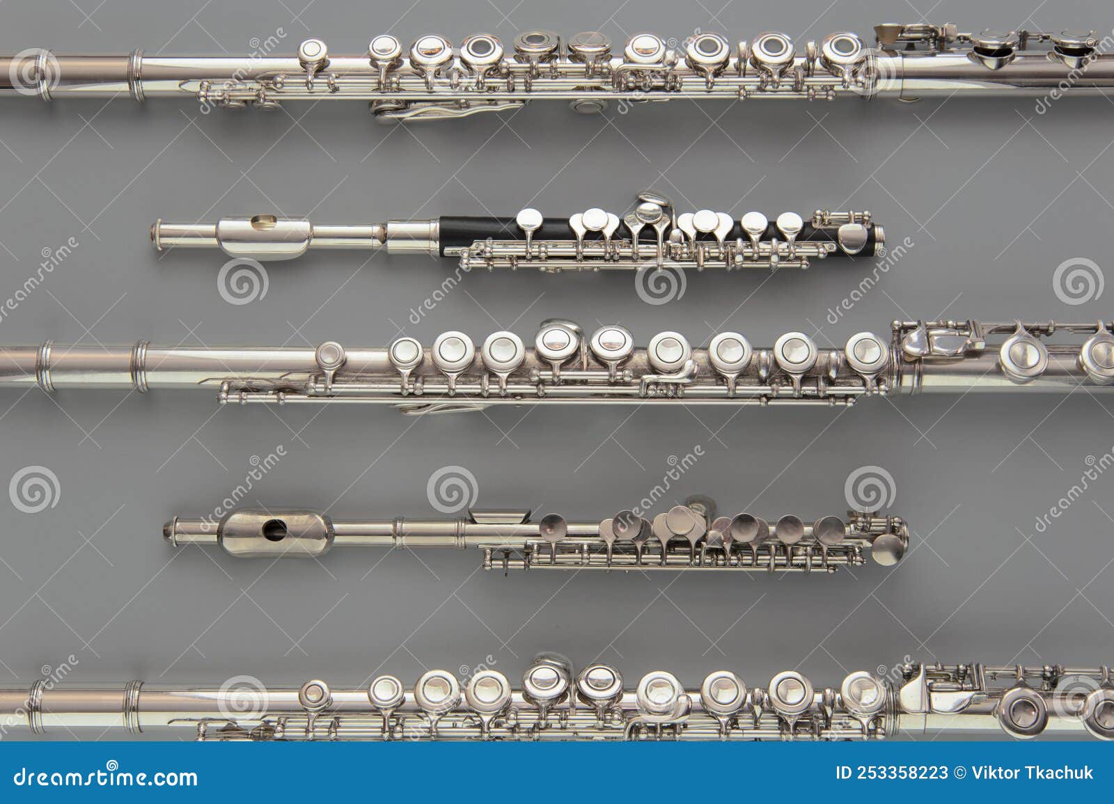 Different Musical Instruments Flute Stacked on a Gray Surface Stock ...