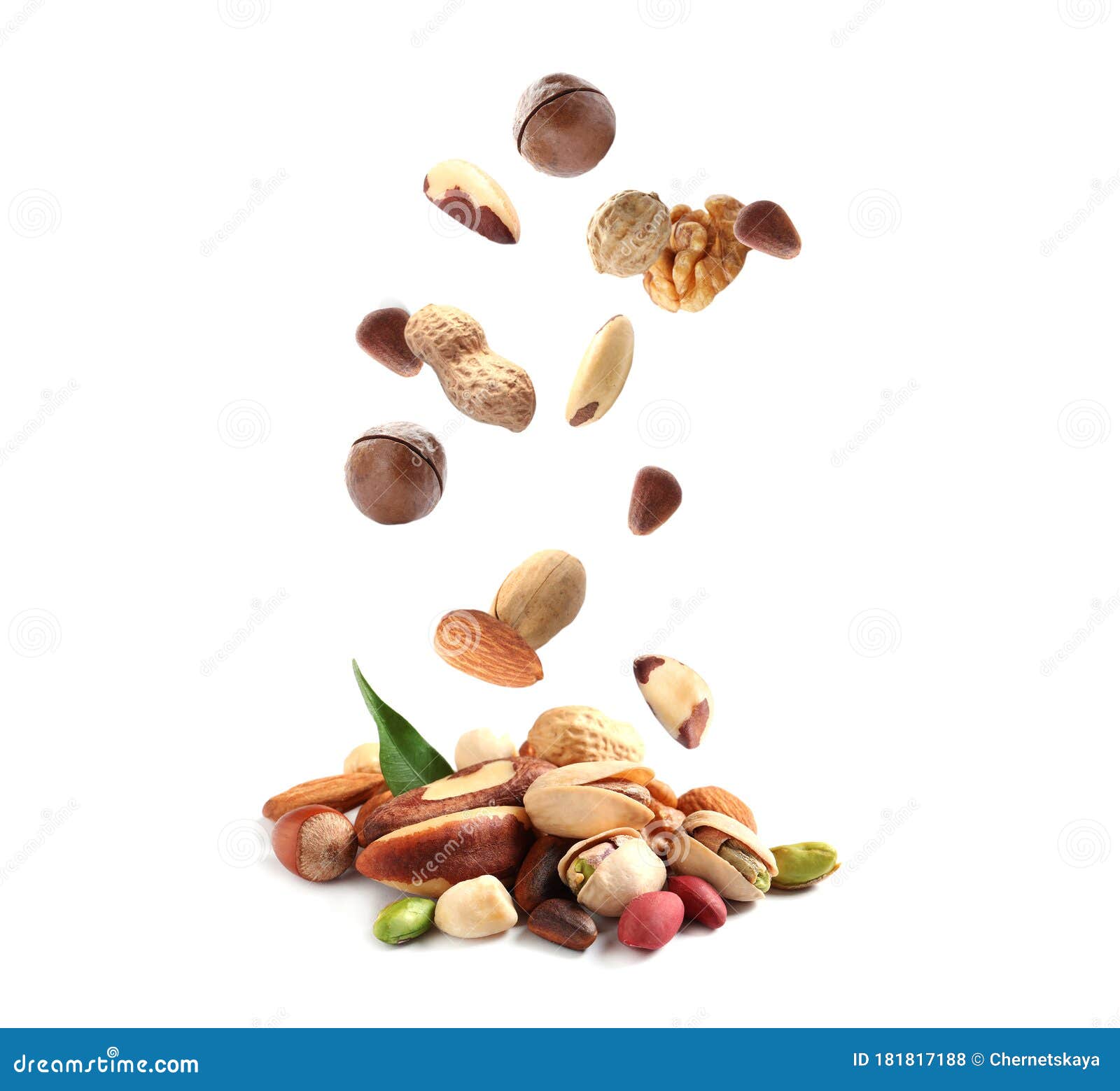 Different Nuts Falling into Pile on Background Stock Photo - Image of ...