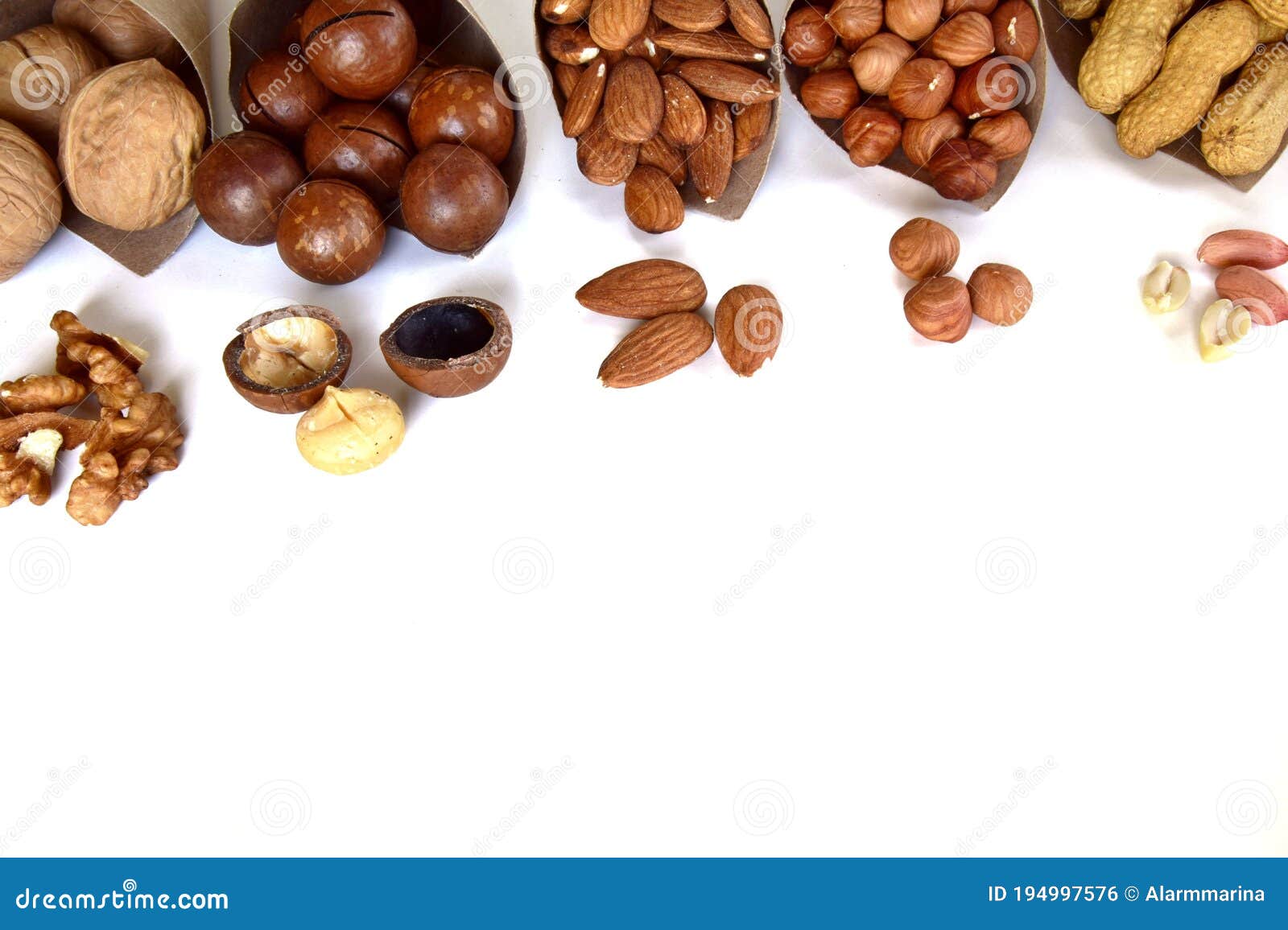 Different Nuts Source of Protein on a Light Background Close-up. the ...